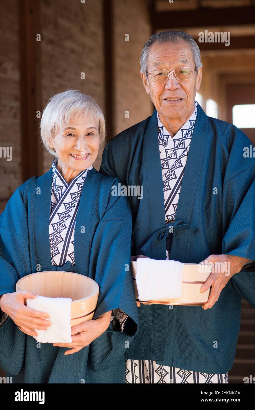 Senior couple in yukata and haori at the hot spring Stock Photo - Alamy