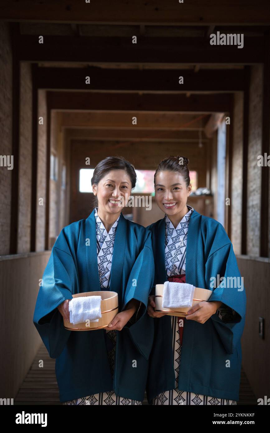 Mother and daughter in yukata and haori at a hot spring Stock Photo - Alamy