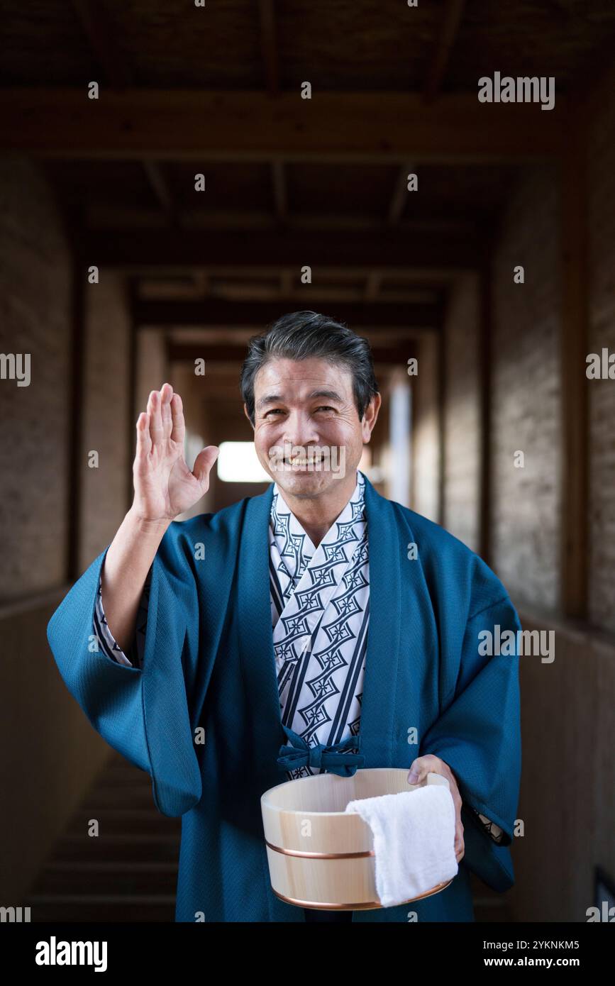 Middle-aged man in yukata and haori at onsen Stock Photo - Alamy