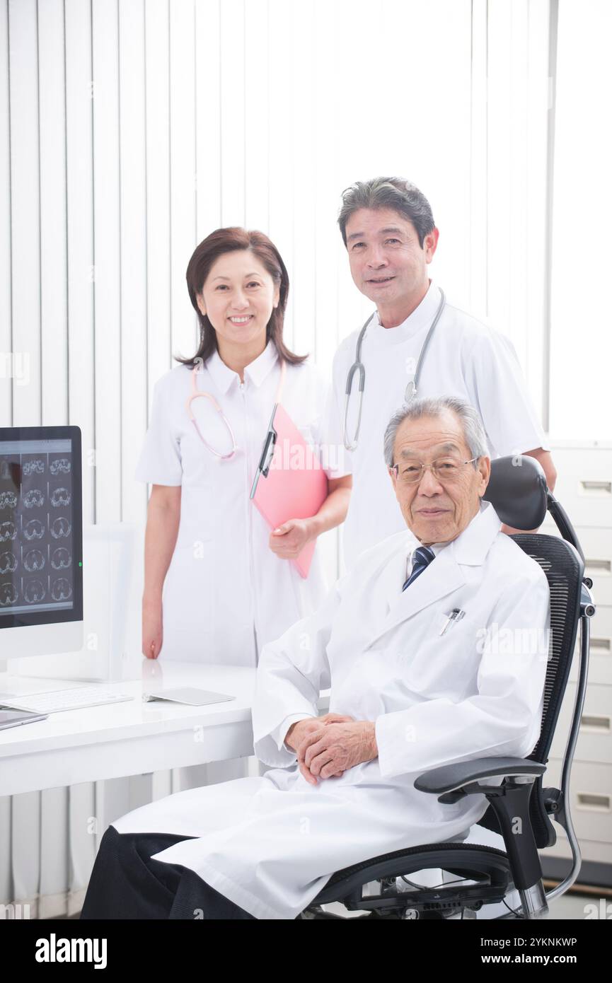 Doctor and nurse in examination room Doctor and nurse in examination ...