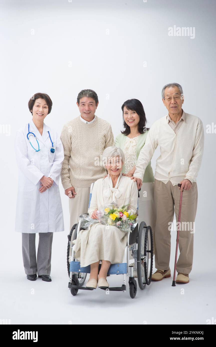 Senior woman in wheelchair being discharged from hospital, her family ...