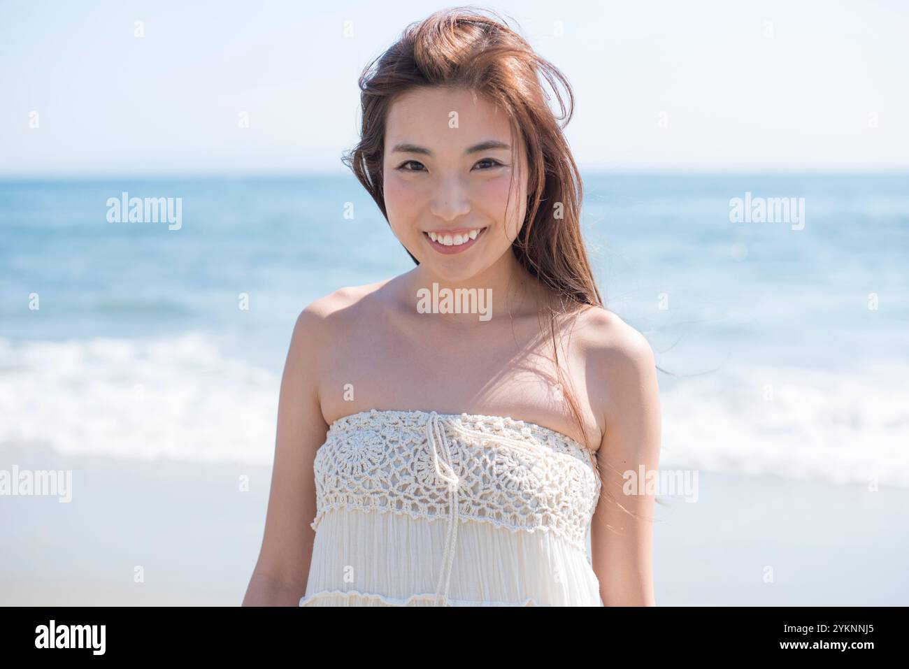 Woman walking barefoot on sea sand beach Stock Photo - Alamy