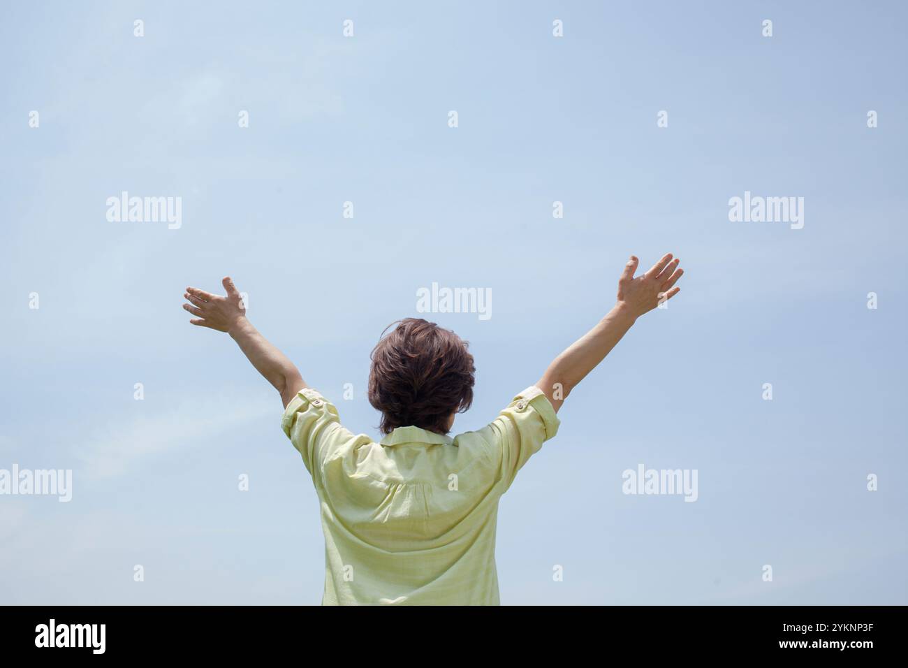 Hand reaching back hi-res stock photography and images - Alamy