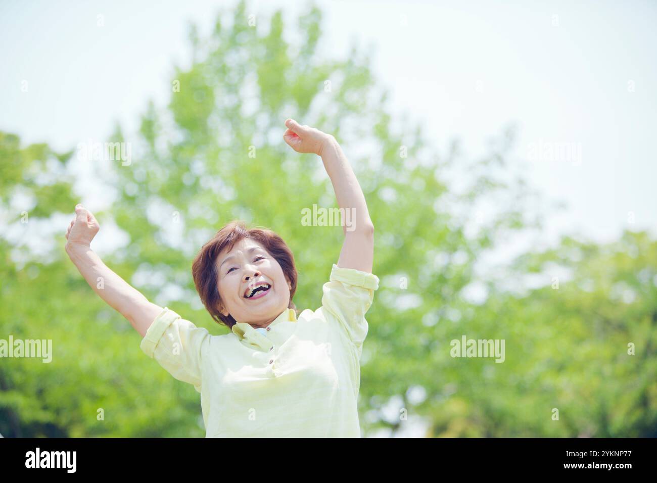 Senior woman reaching out hi-res stock photography and images - Alamy