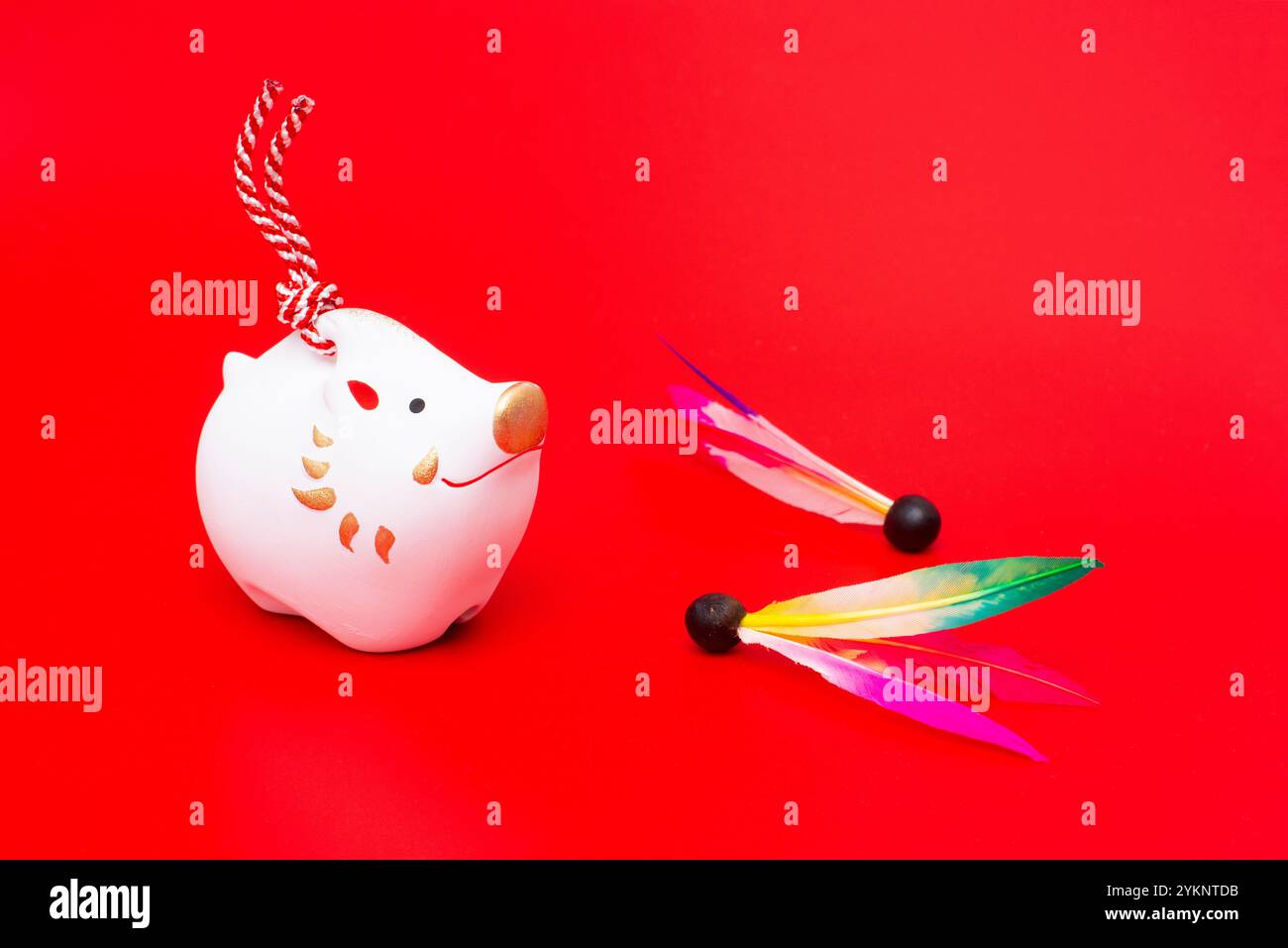 Wild boar and lion dance figure and feather Stock Photo - Alamy