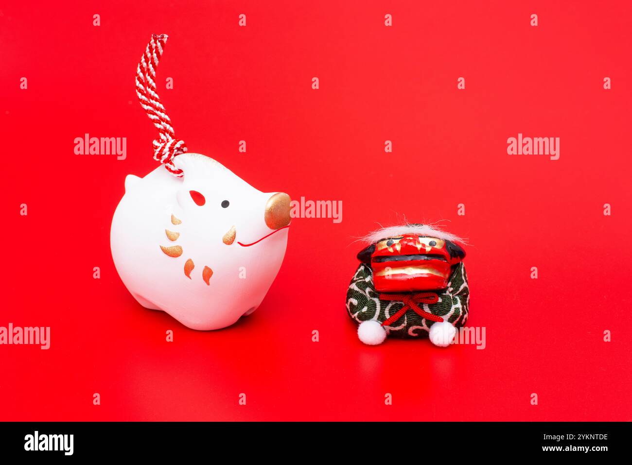 Wild boar and lion dance figure Stock Photo - Alamy