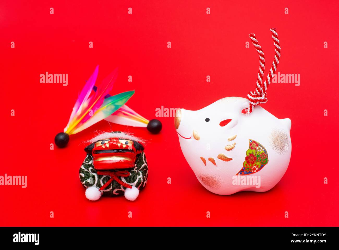 Wild boar and lion dance figures and feathers Stock Photo - Alamy