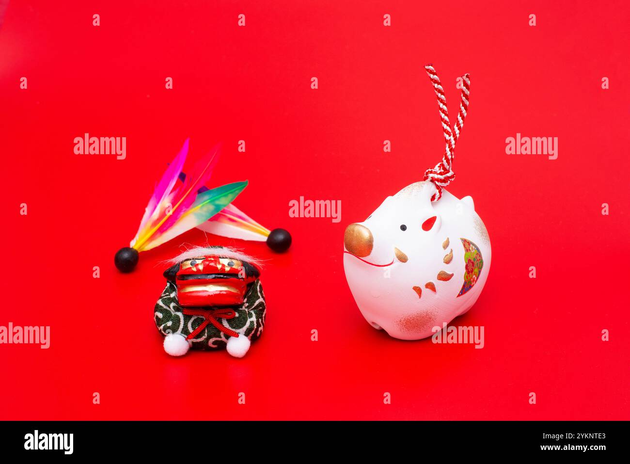 Wild boar and lion dance figures and feathers Stock Photo - Alamy
