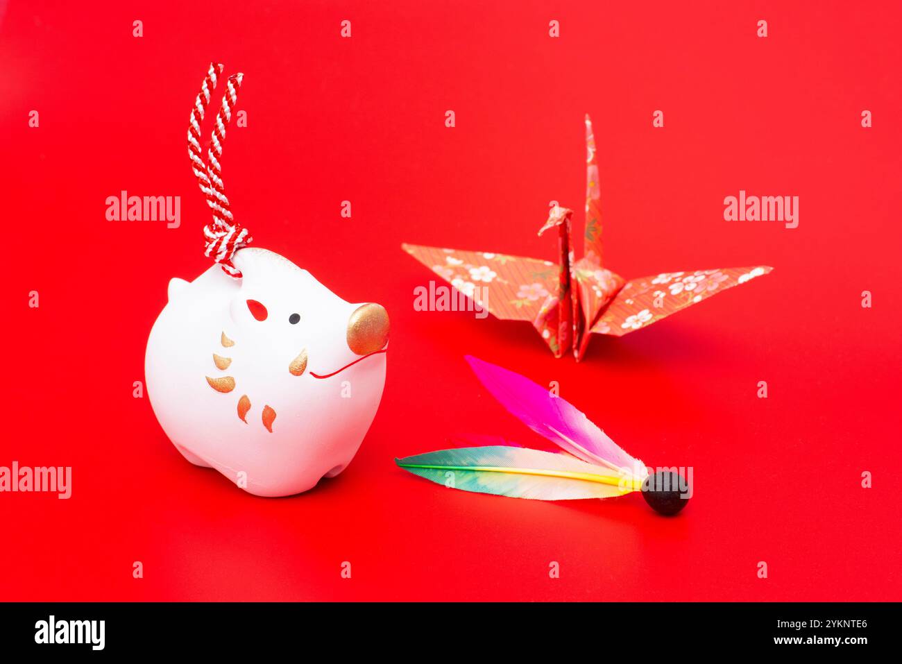 Wild boar figure and feather,Origami crane Stock Photo - Alamy
