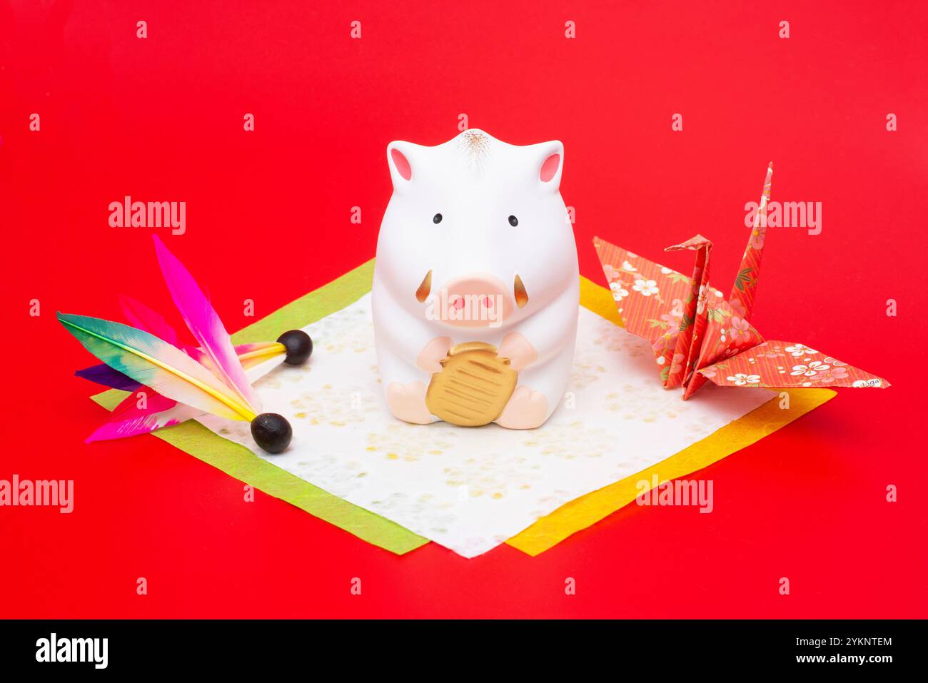 Wild boar figure and feather,Origami crane Stock Photo - Alamy