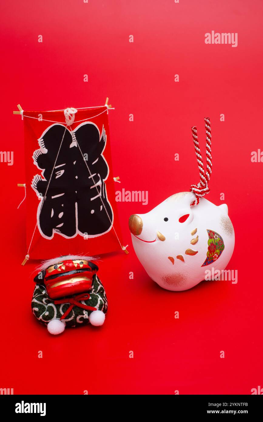 Lion dance, wild boar figure and kite Stock Photo - Alamy