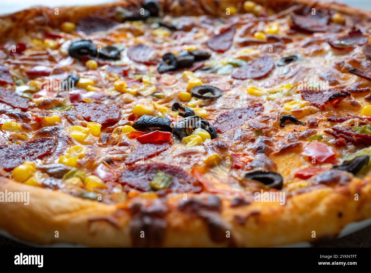 manually picking pizza slice in cardboard Stock Photo - Alamy