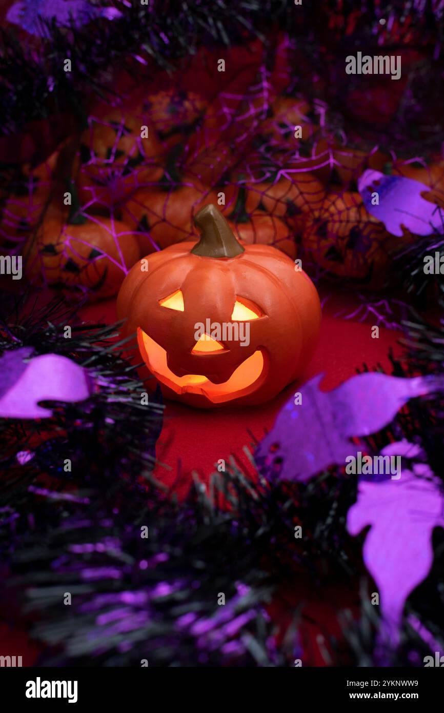 Pumpkin figure and ghost braid, spider web Stock Photo - Alamy