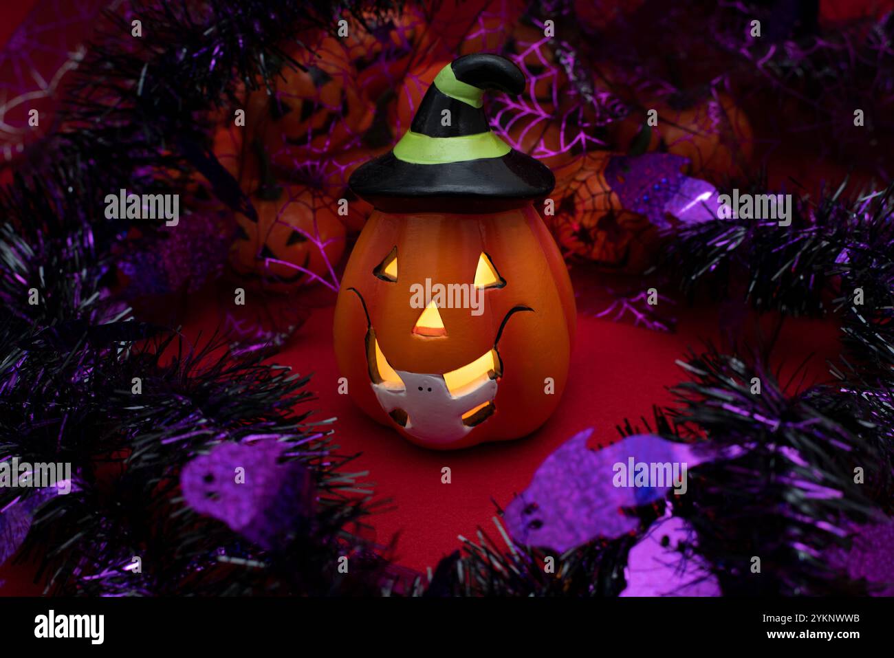 Pumpkin ghost figure and ghost braid, spider web Stock Photo - Alamy