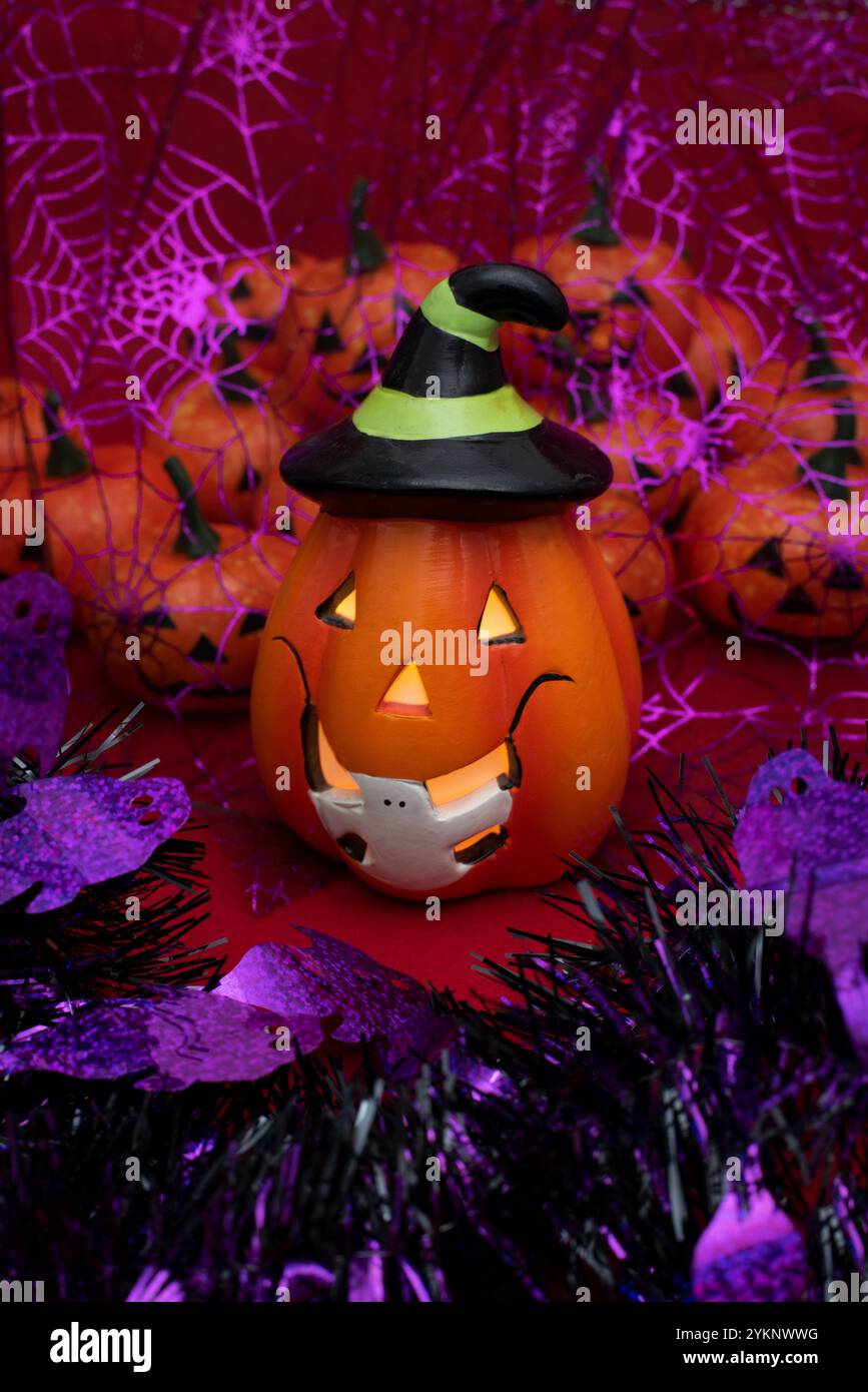 Pumpkin ghost figure and ghost braid, spider web Stock Photo - Alamy