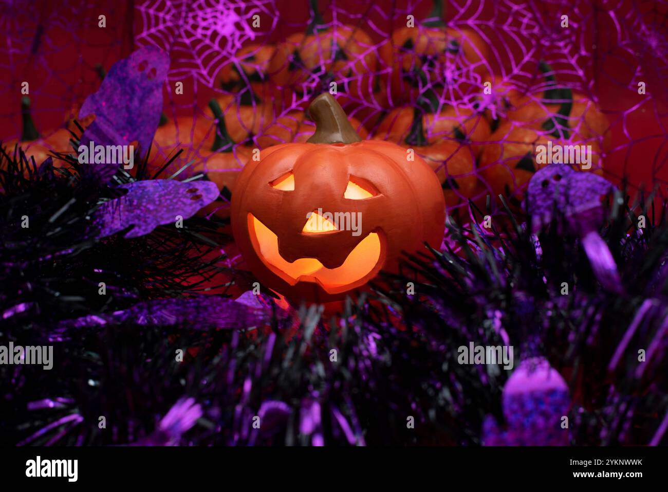 Pumpkin figure and ghost braid, spider web Stock Photo - Alamy
