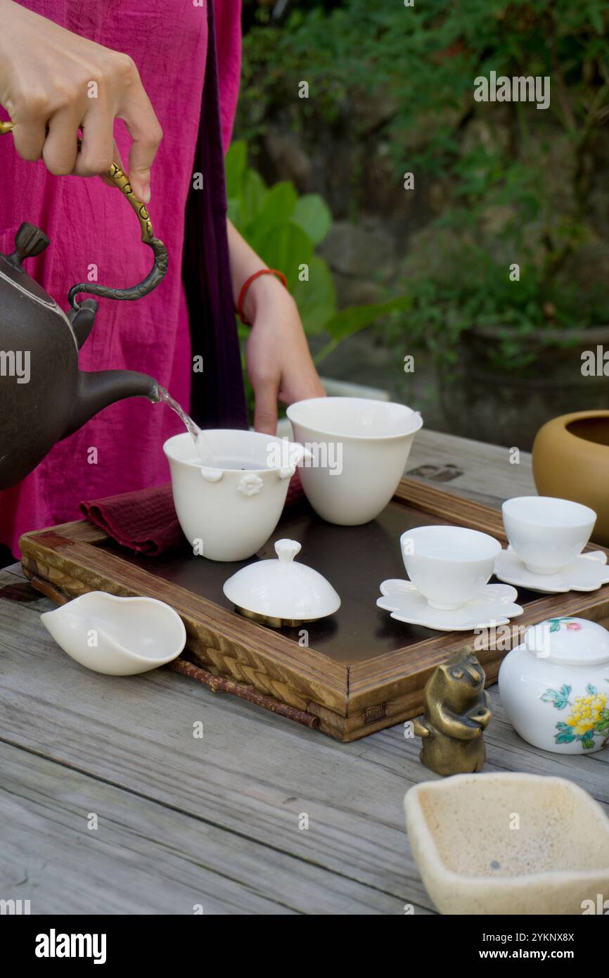 Hands making Taiwanese tea Stock Photo - Alamy