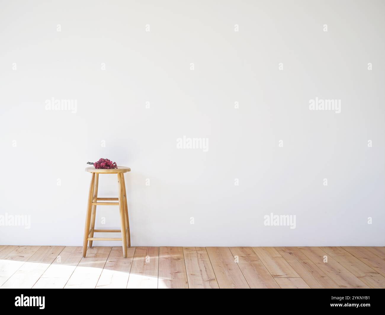 Wooden floor, stool and greenery Stock Photo - Alamy