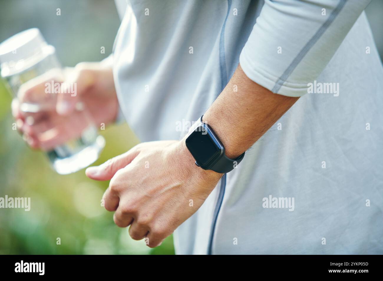 Man wearing a smartwatch Stock Photo - Alamy