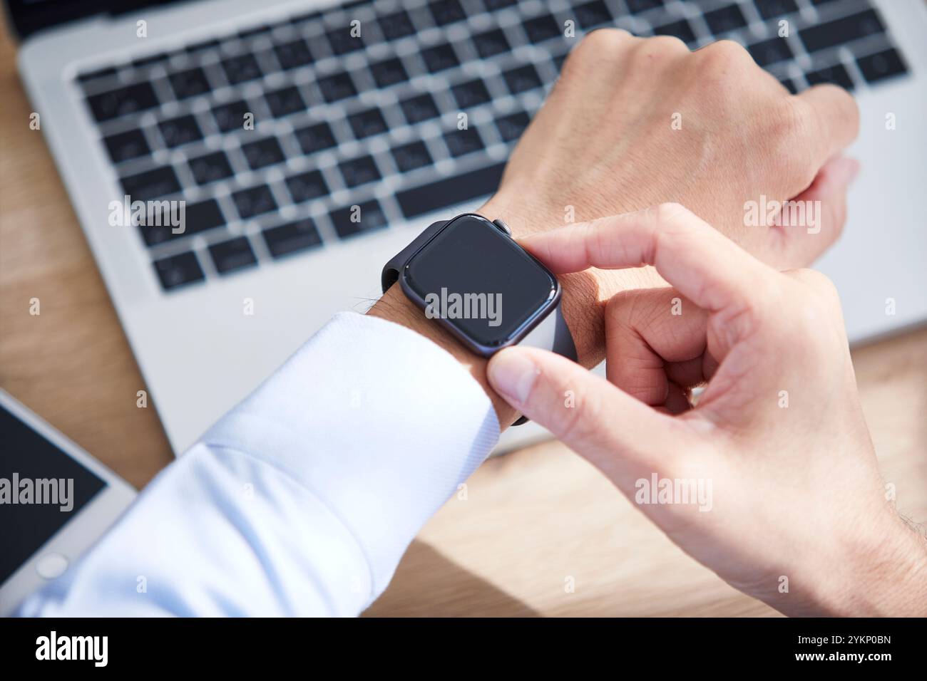 Man using a smartwatch Stock Photo - Alamy