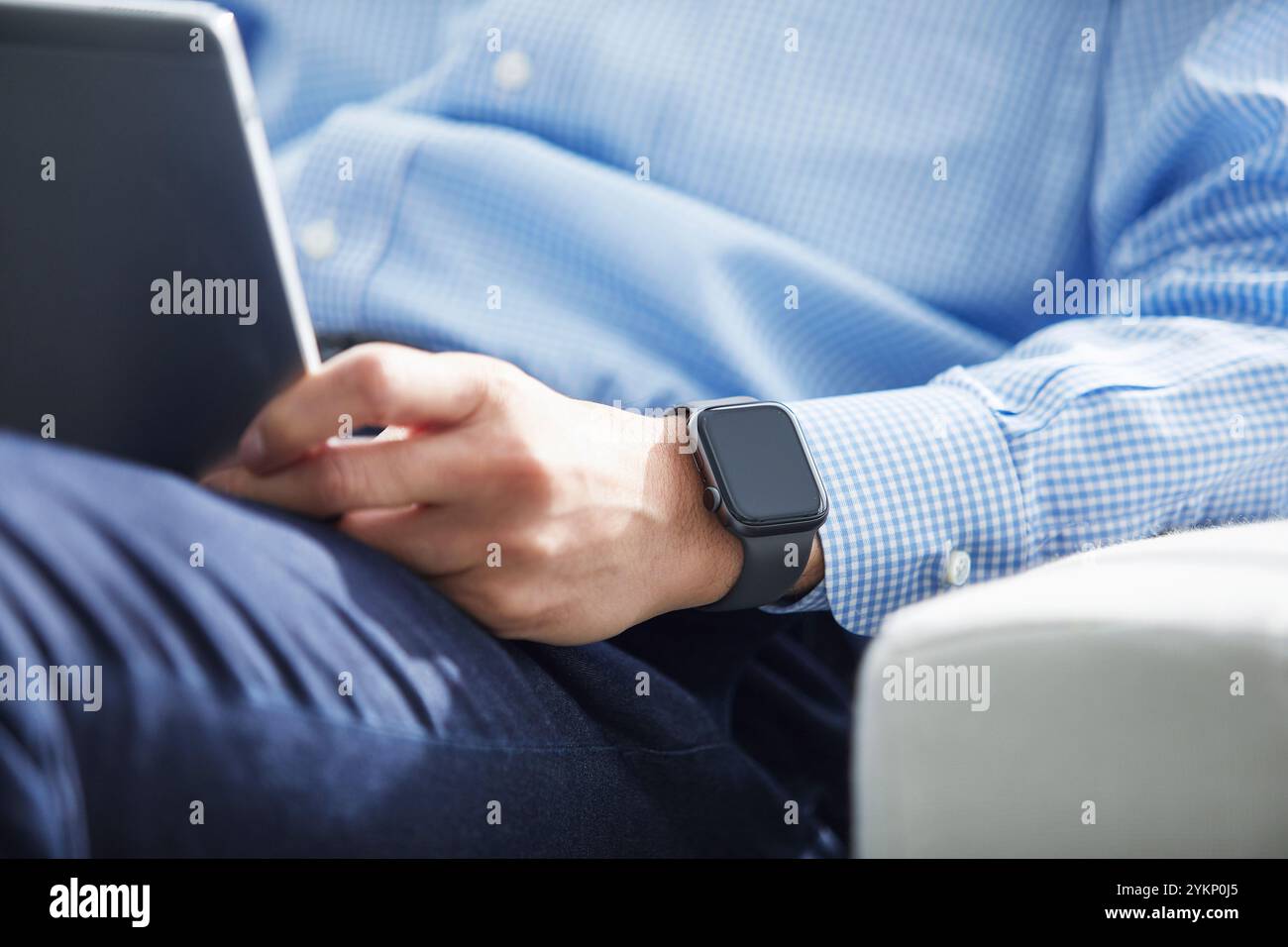Man wearing a smartwatch Stock Photo - Alamy