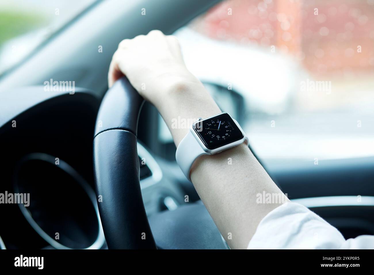 Smartwatch, car and woman's hand Stock Photo - Alamy