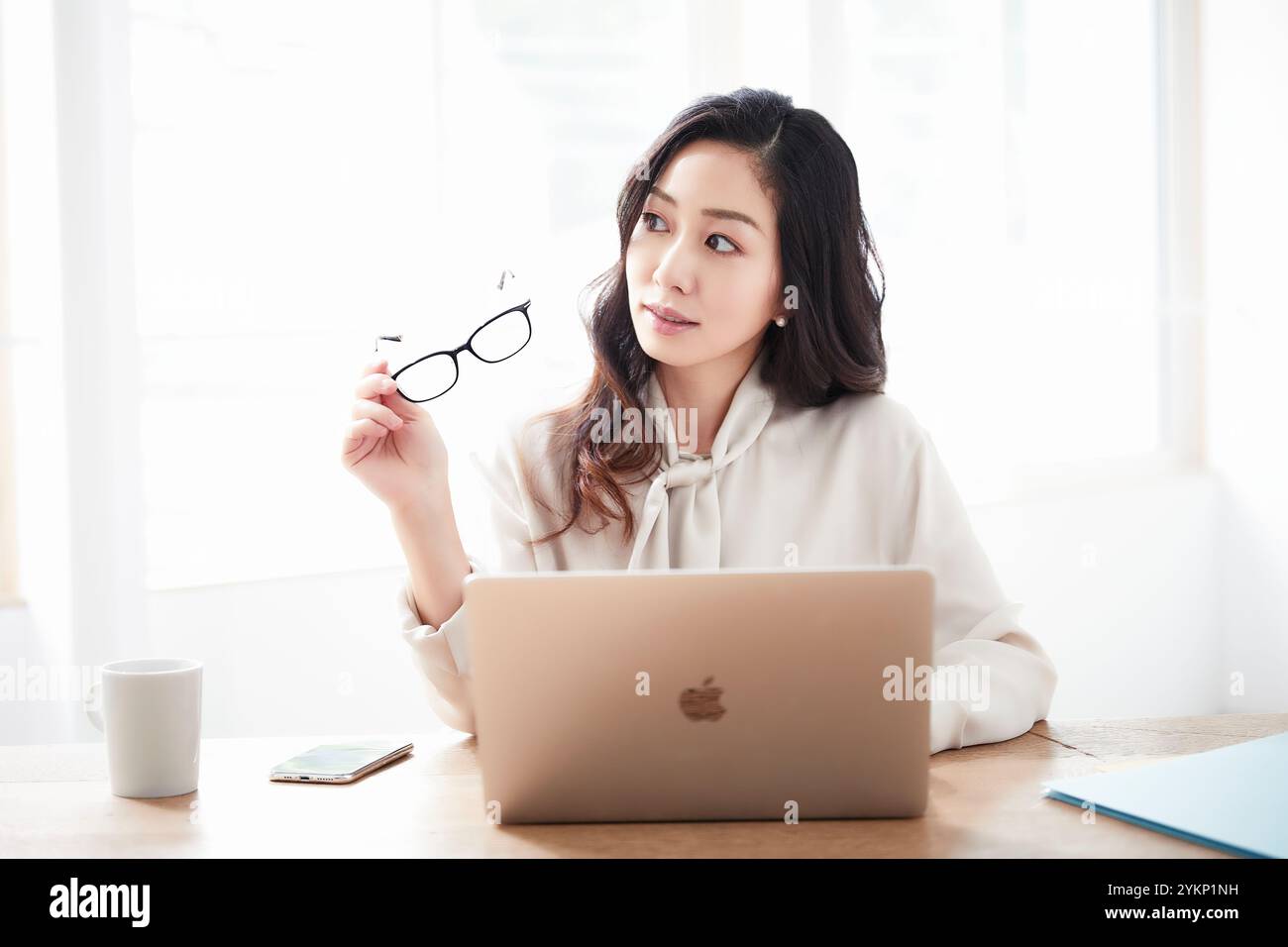 Busy woman sit table hi-res stock photography and images - Alamy