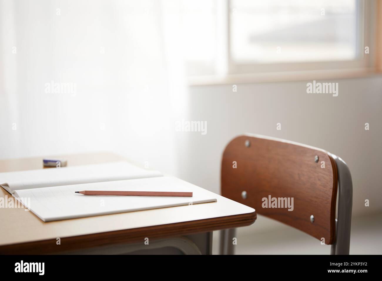 Writing materials on study desk Stock Photo - Alamy