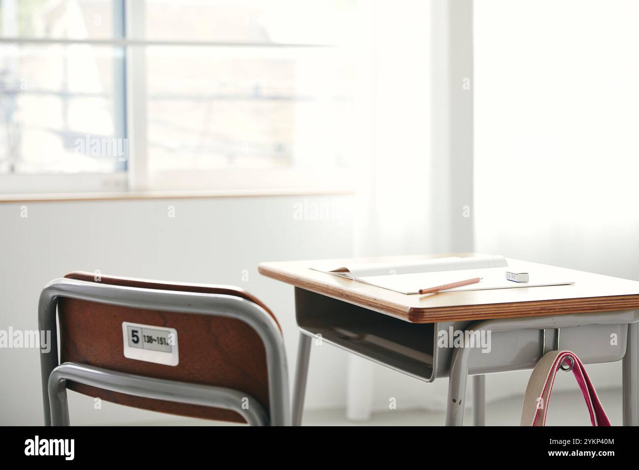 Writing materials on study desk Stock Photo - Alamy