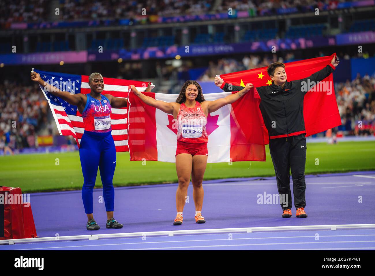 Camryn Rogers,Annette Echikunwoke. and Jie ZHAO celebrating her medal ...