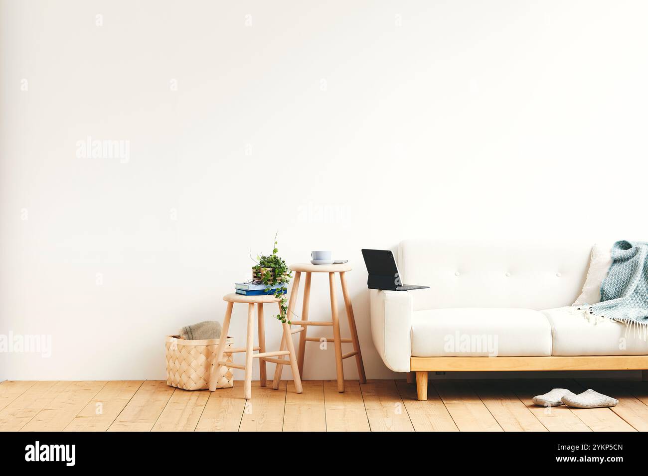 Stool and sofa in the room Stock Photo - Alamy