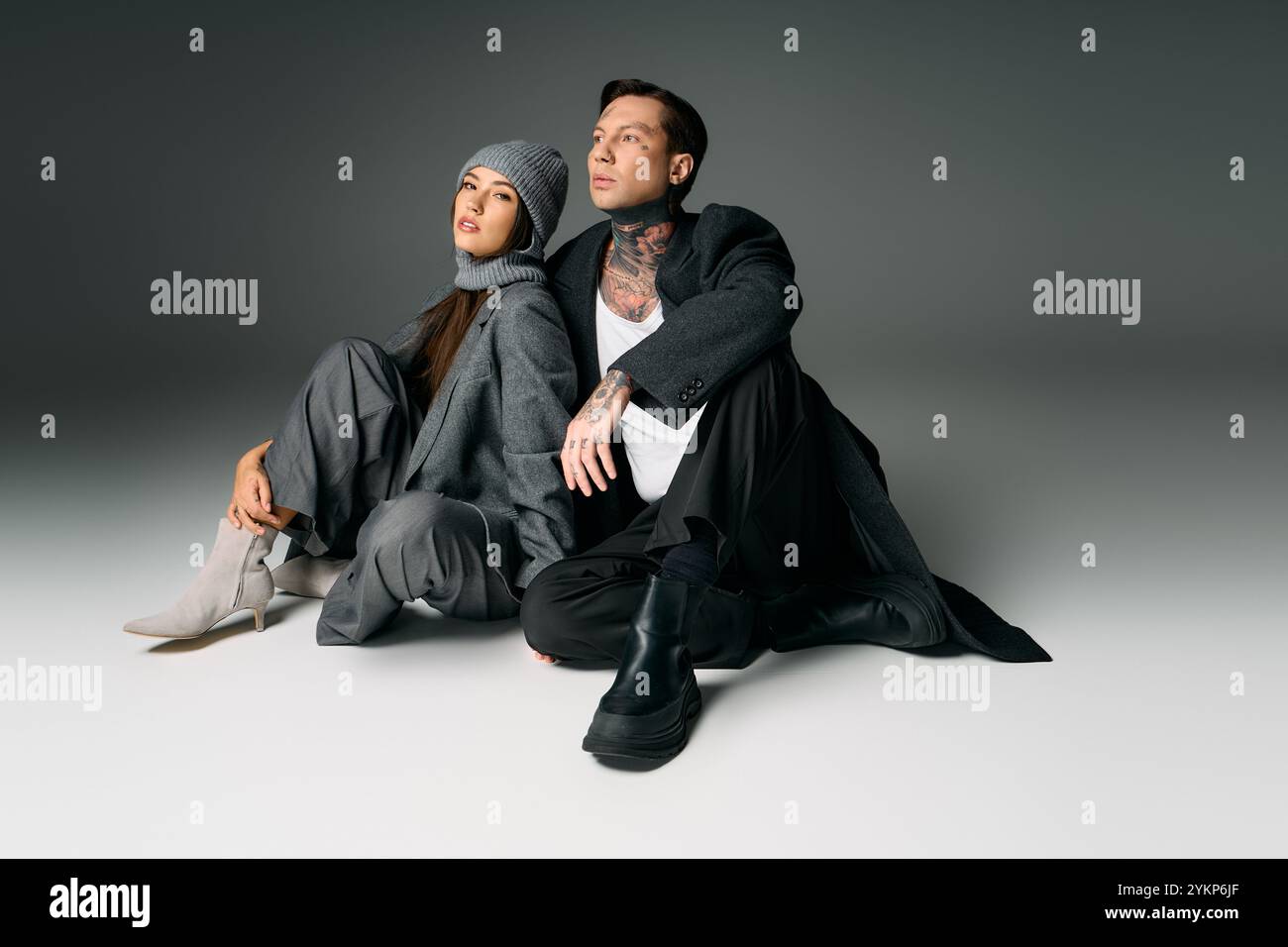 A stylish duo poses together, flaunting their trendy outfits and ...