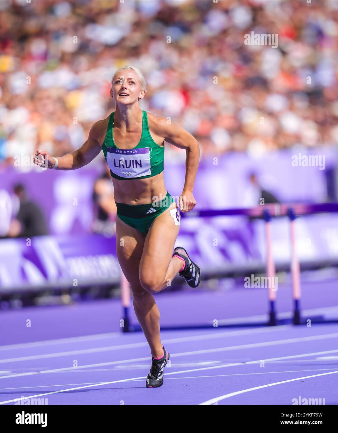Sarah Lavin participating in the 100 meters hurdles at the Paris 2024 ...