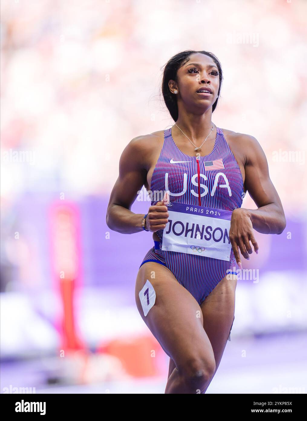 Alaysha Johnson participating in the 100 meters hurdles at the Paris ...