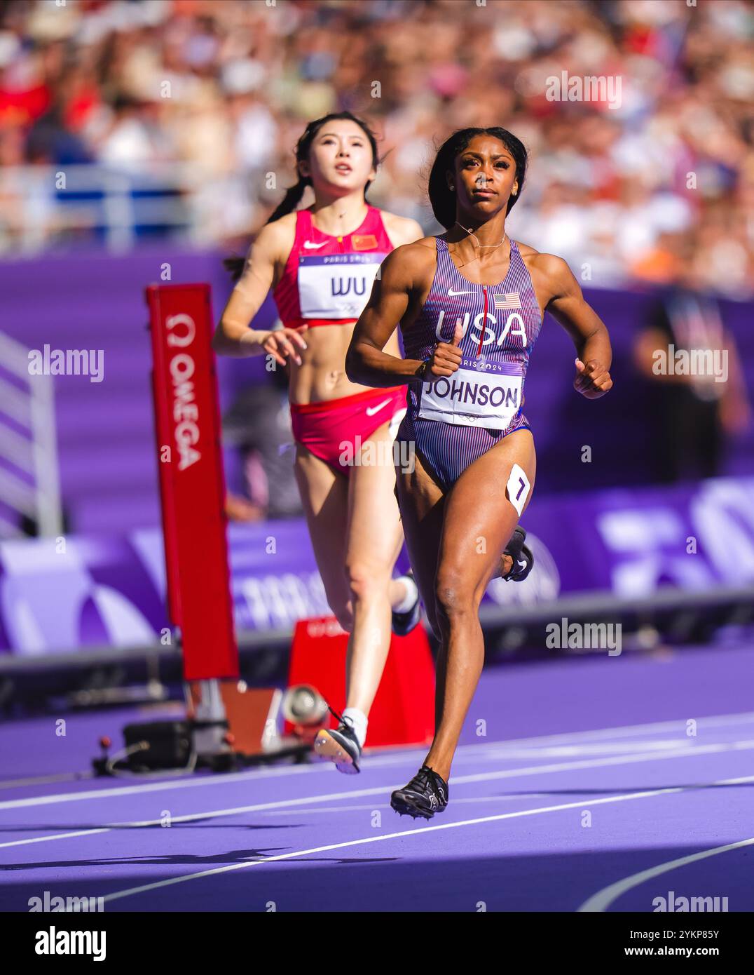 Alaysha Johnson participating in the 100 meters hurdles at the Paris ...