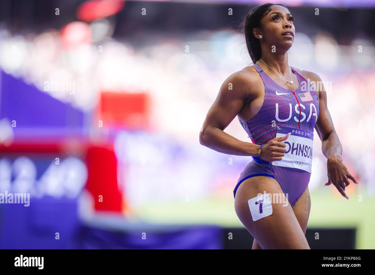Alaysha Johnson participating in the 100 meters hurdles at the Paris ...