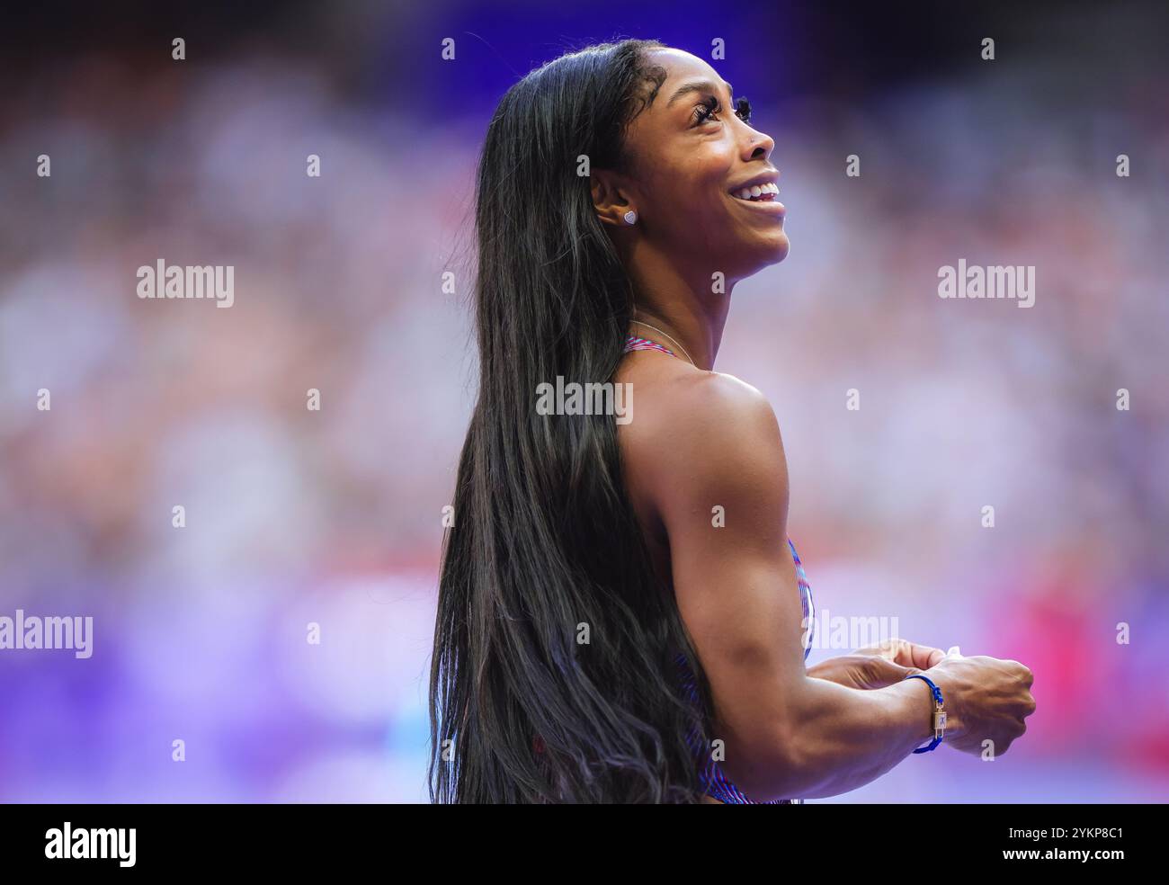 Alaysha Johnson participating in the 100 meters hurdles at the Paris ...
