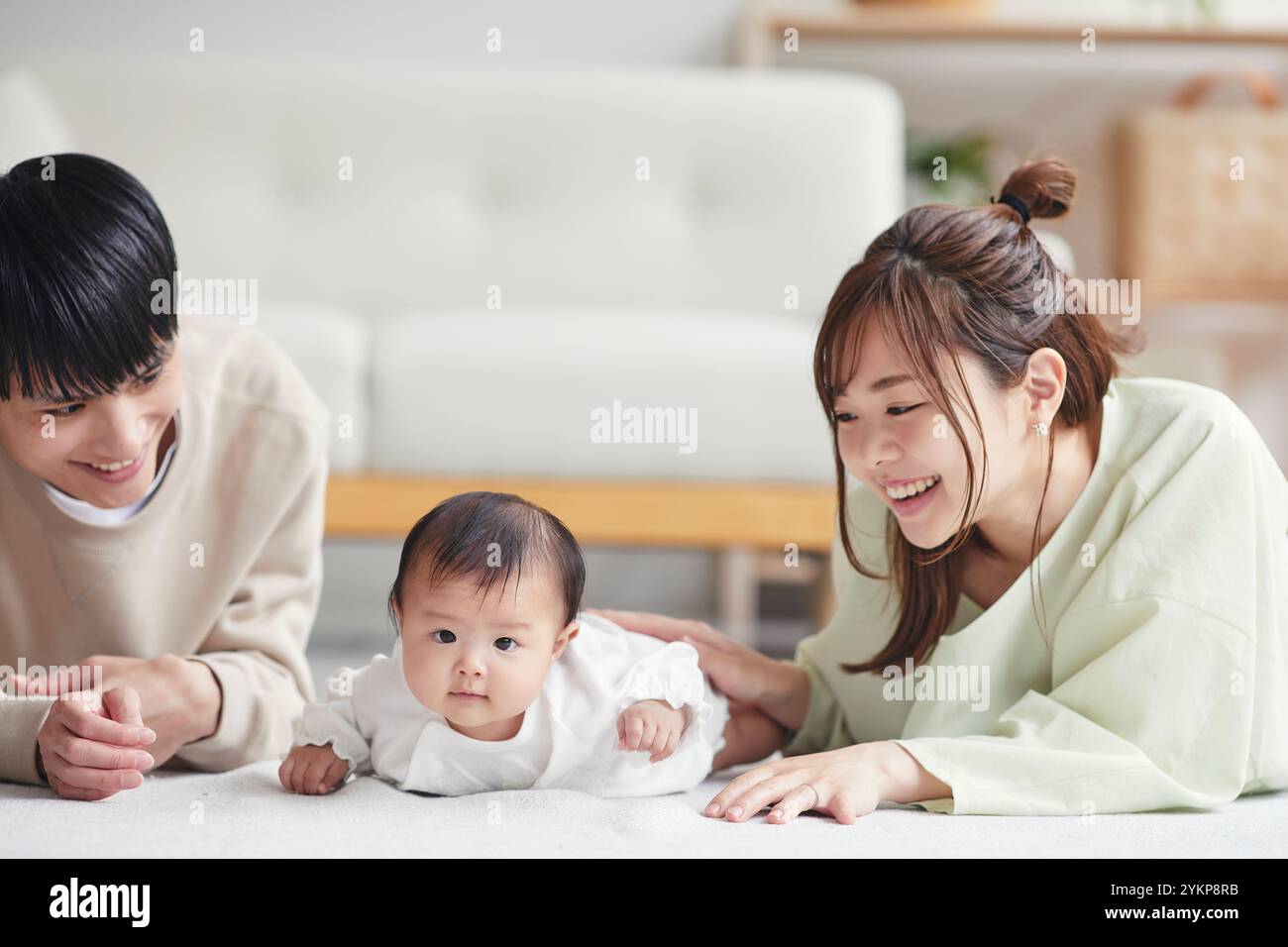 Parent and child playing in the living room Stock Photo - Alamy