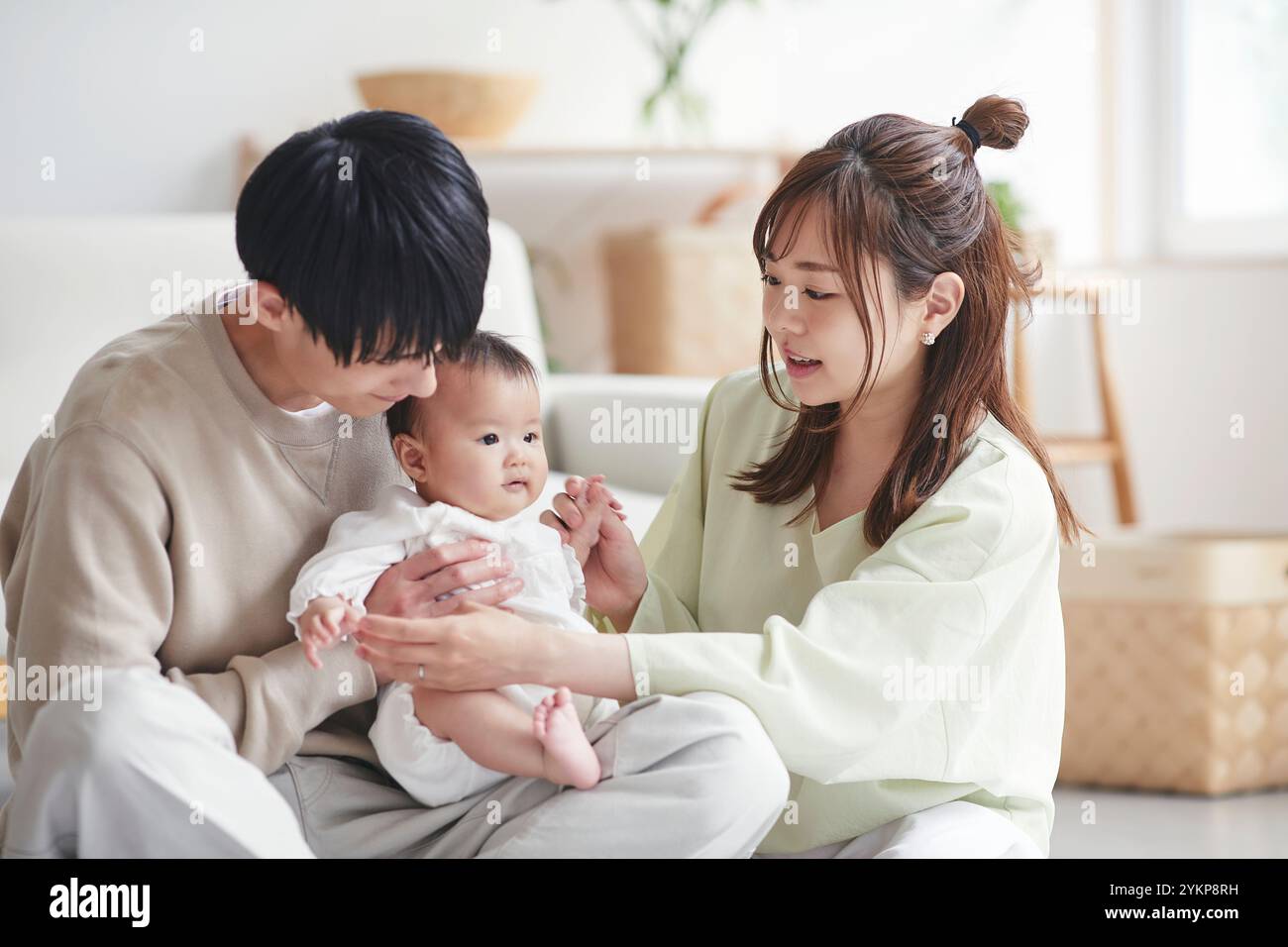 Parent and child playing in the living room Stock Photo - Alamy