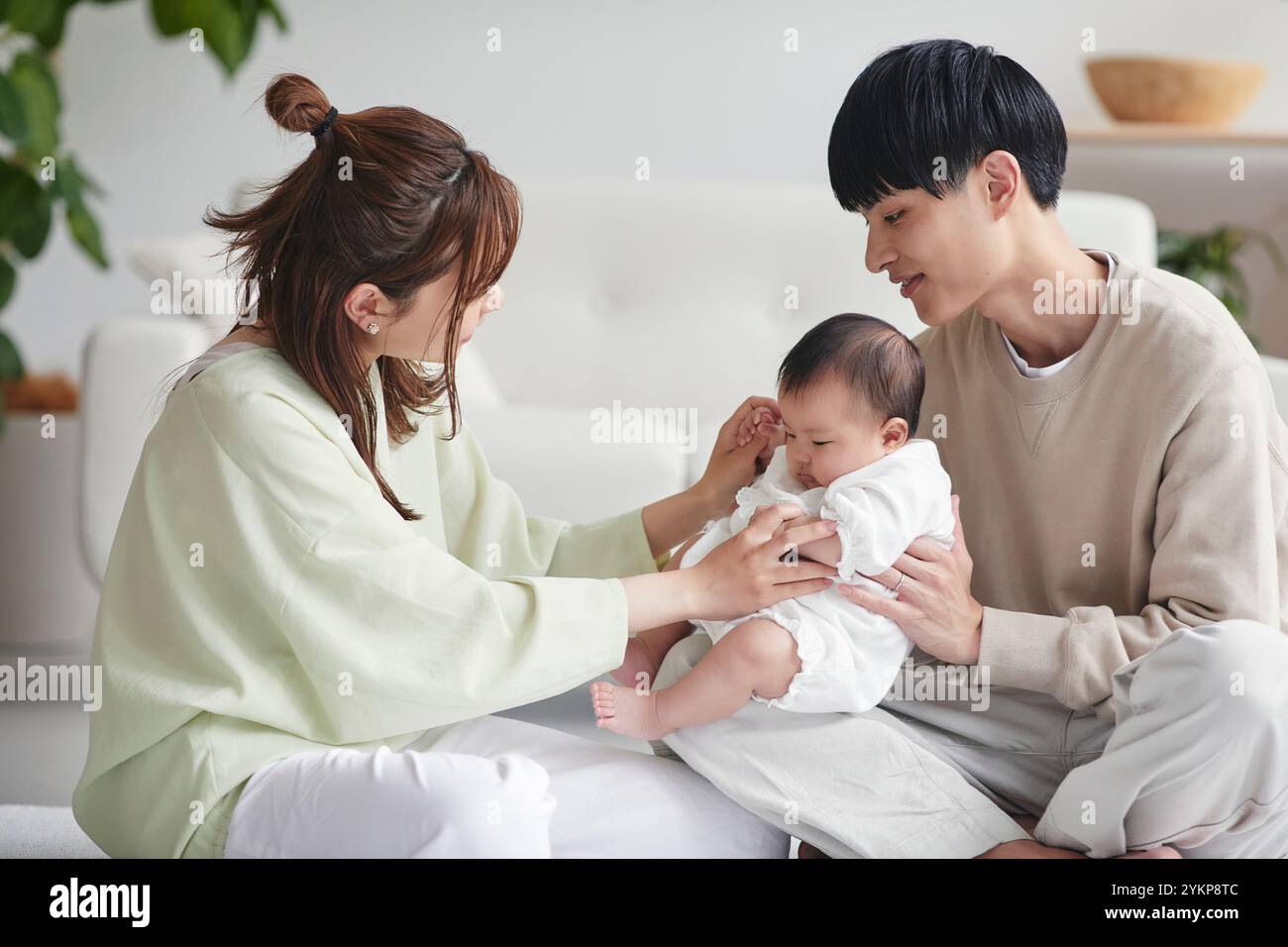 Parent and child playing in the living room Stock Photo - Alamy