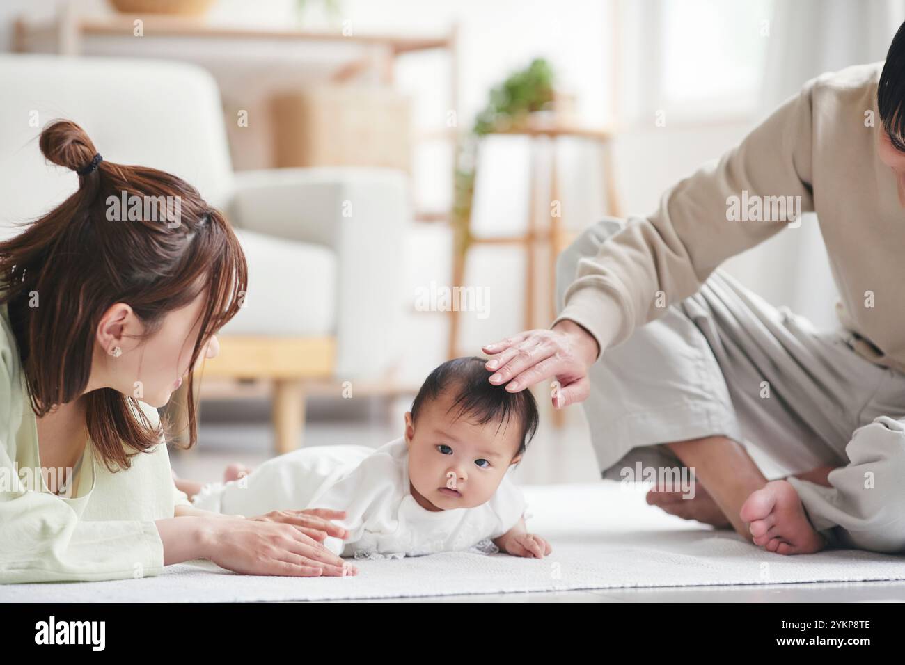 Parent and child playing in the living room Stock Photo - Alamy