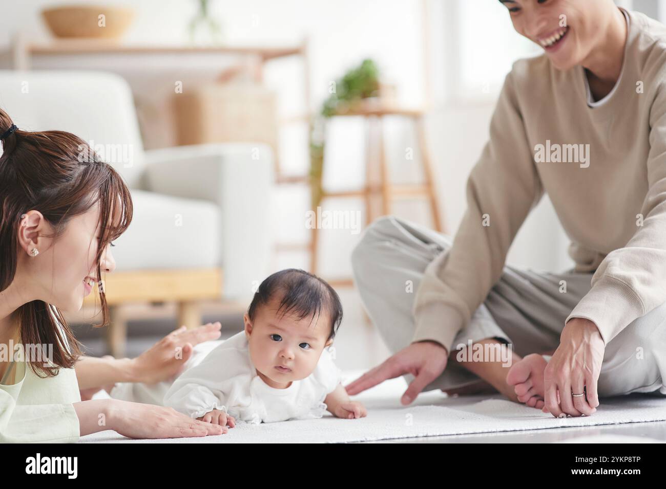 Parent and child playing in the living room Stock Photo - Alamy