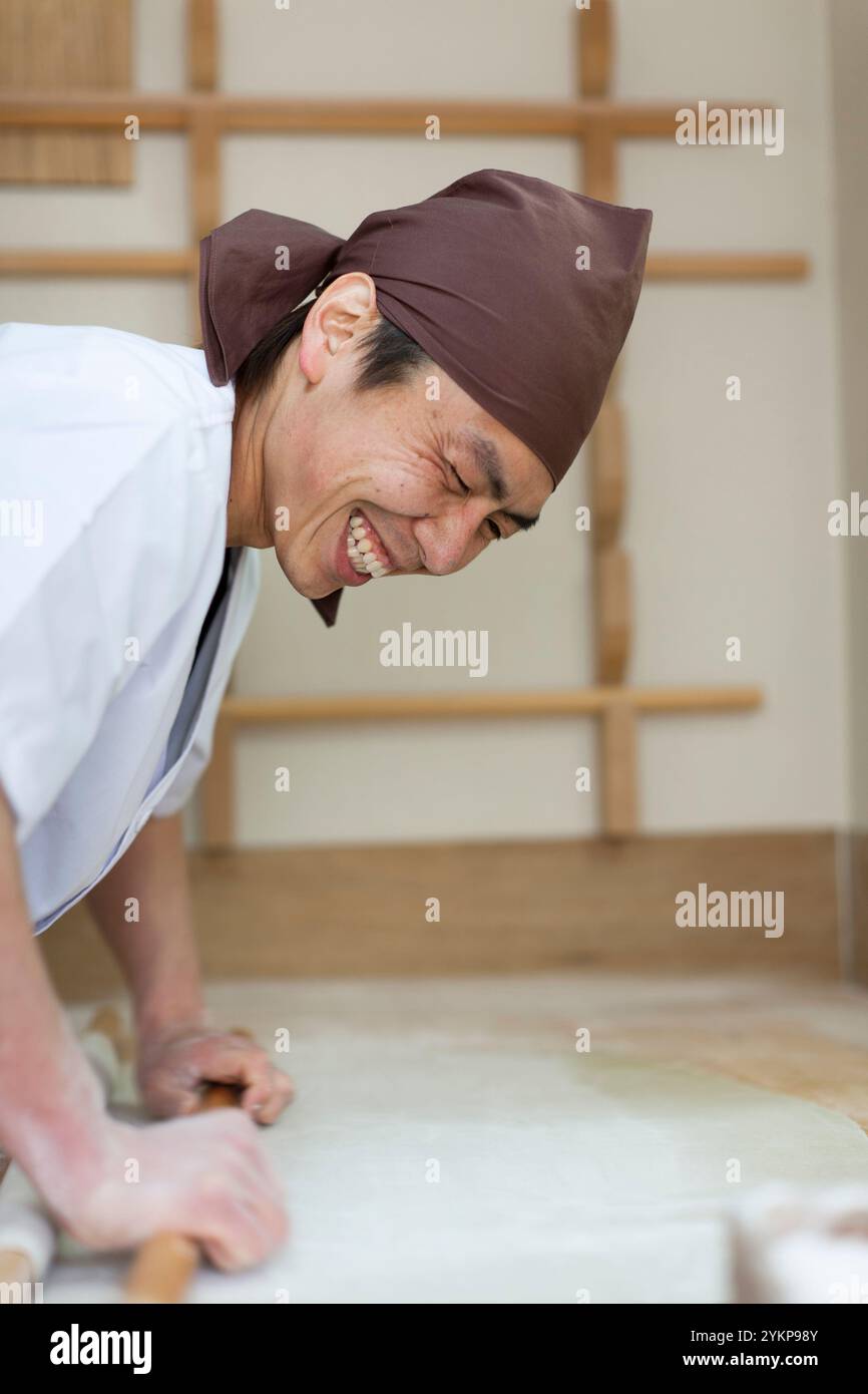 Chef smiling while making handmade soba Stock Photo - Alamy