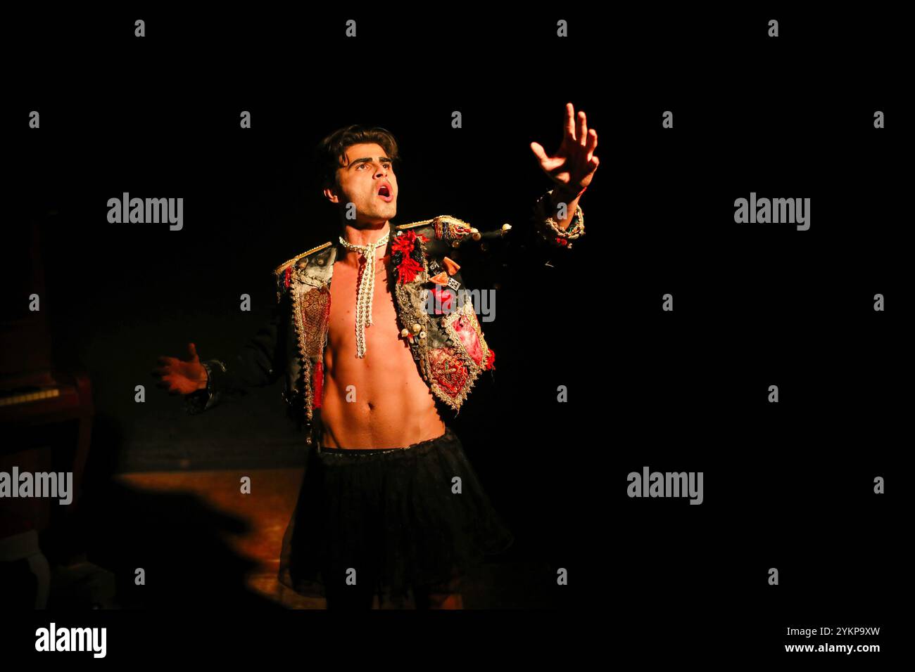 San Lima, a student actor at the CAL theater school, performs in ...