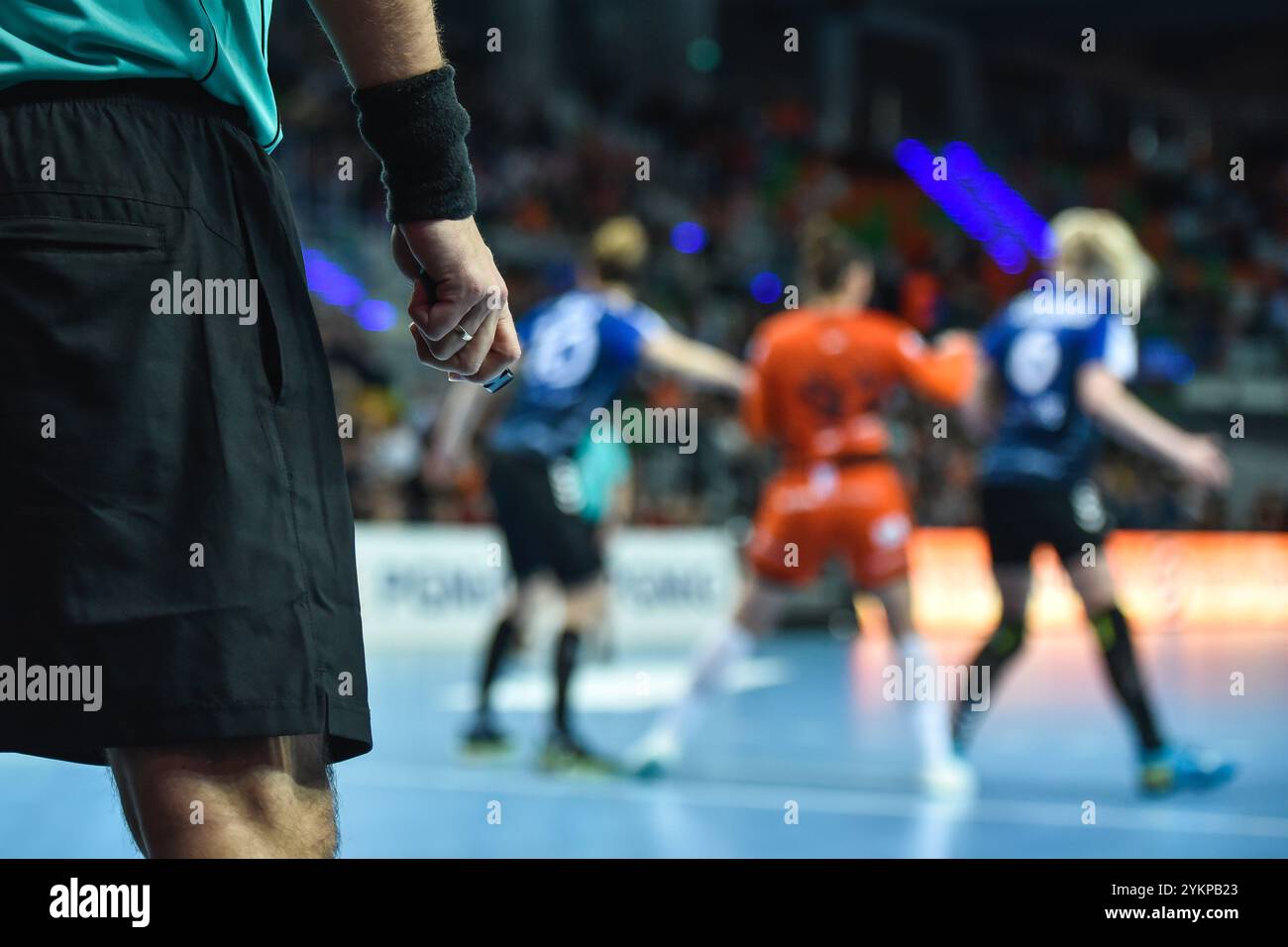 Handball referee hand with whistle Stock Photo - Alamy