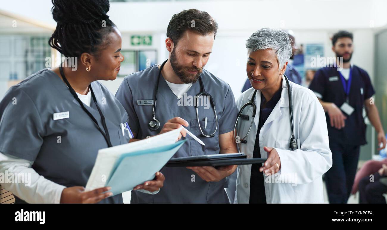 Healthcare, reading and group with tablet, hospital and diversity of ...