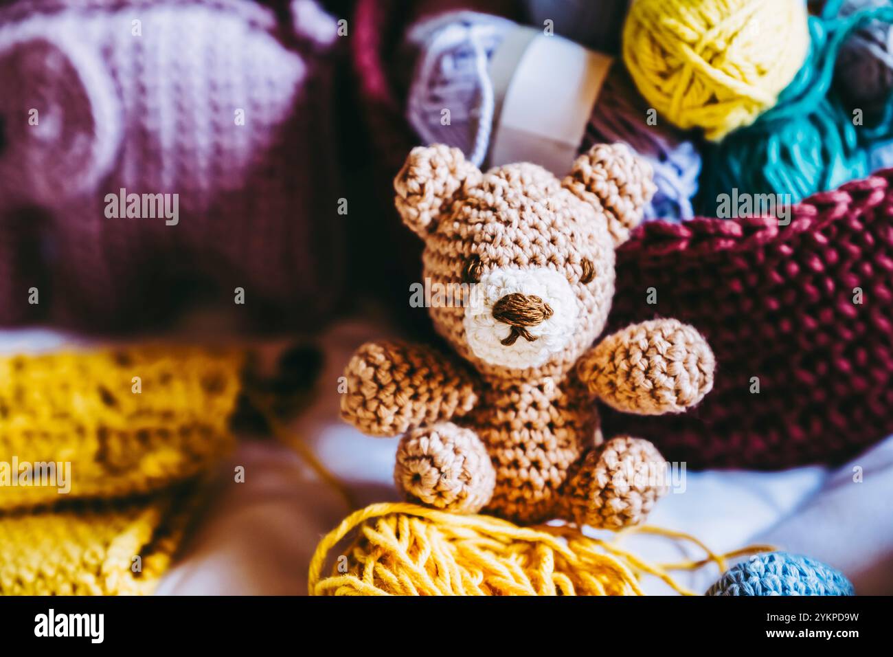 Crochet workshop with work in progress, colorful crochet teddy bear toy ...