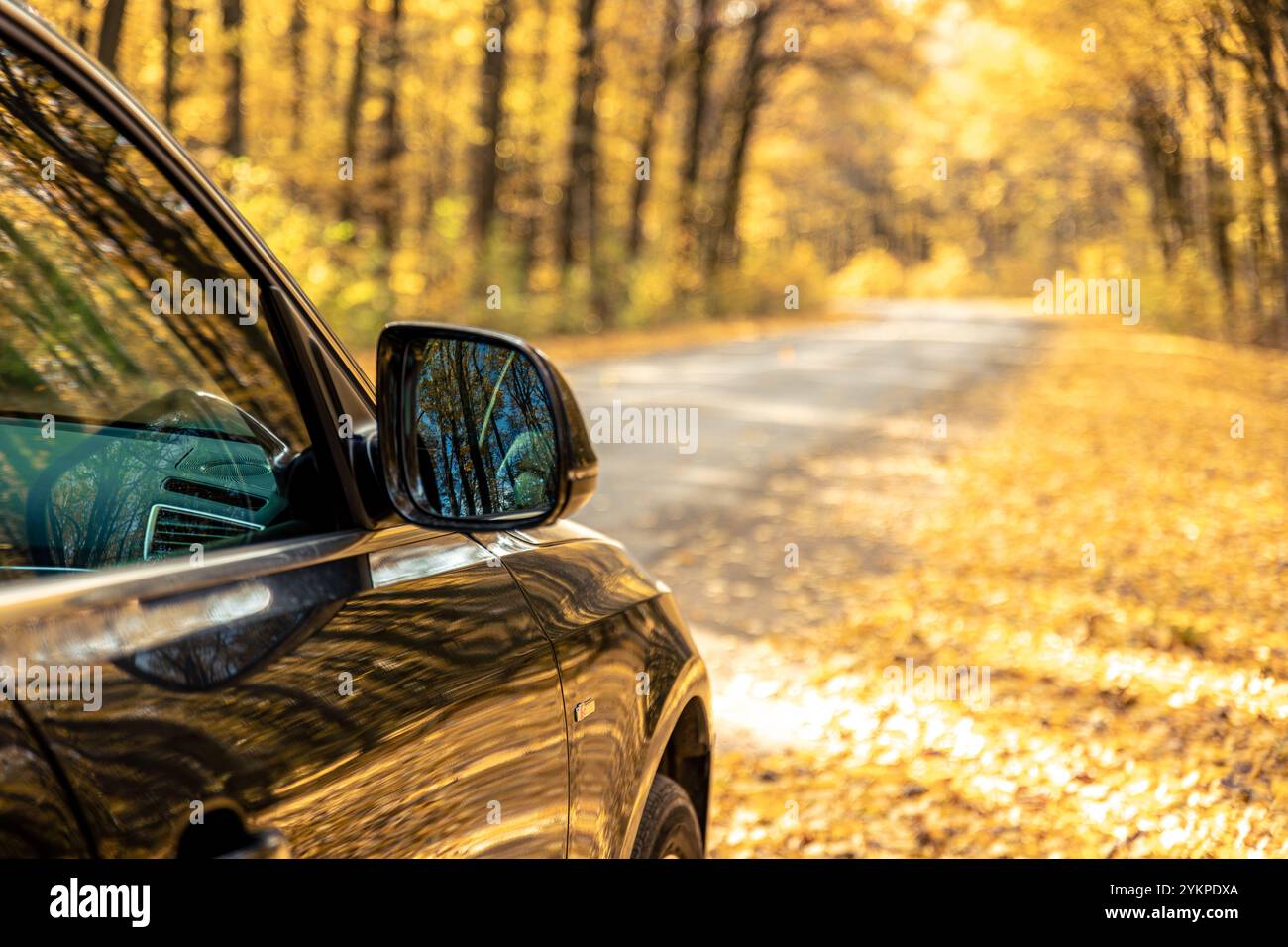 Rear view side mirror of a car. Seen through the rear view mirror Stock ...