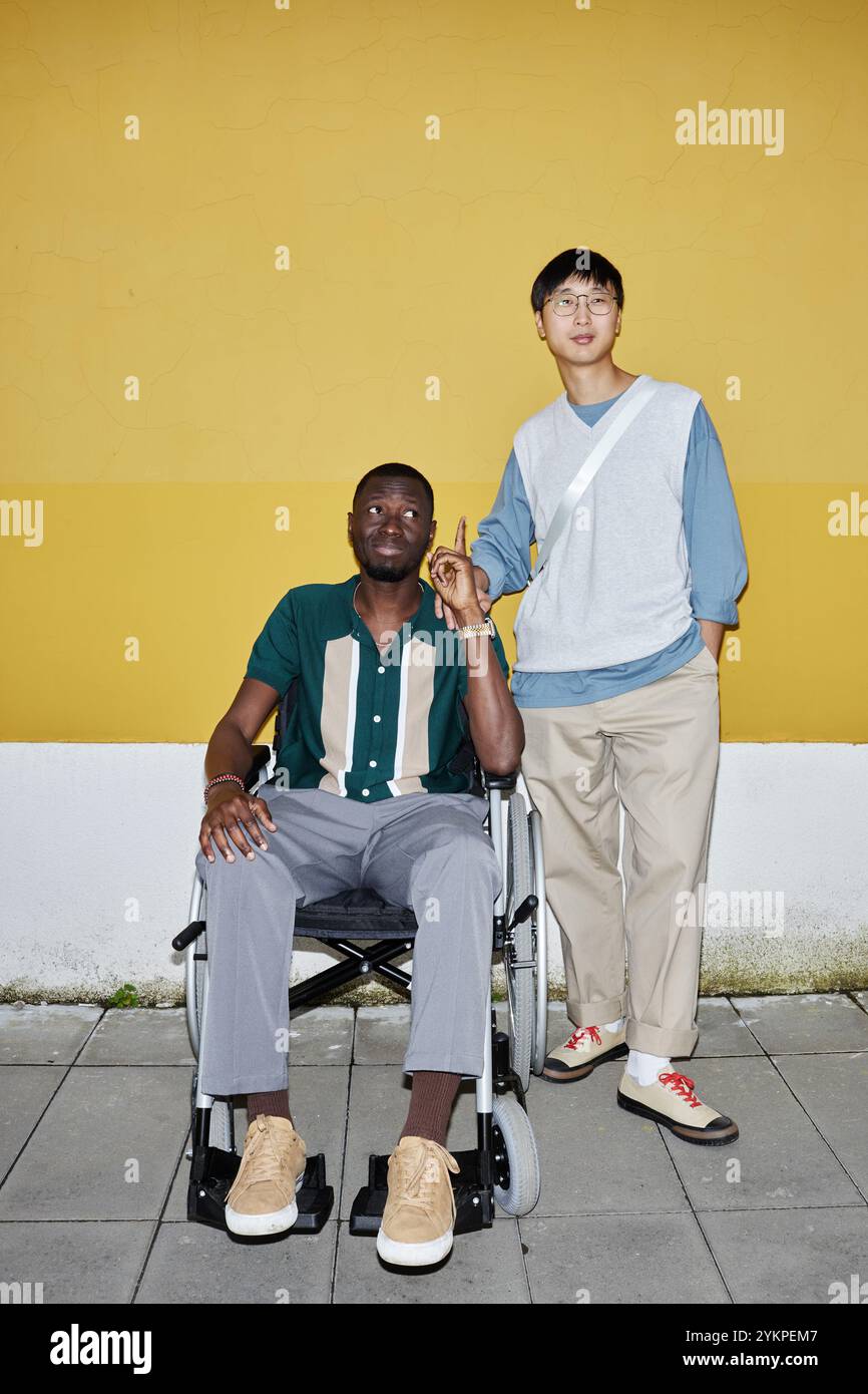 Vertical full length portrait of young African American man with ...