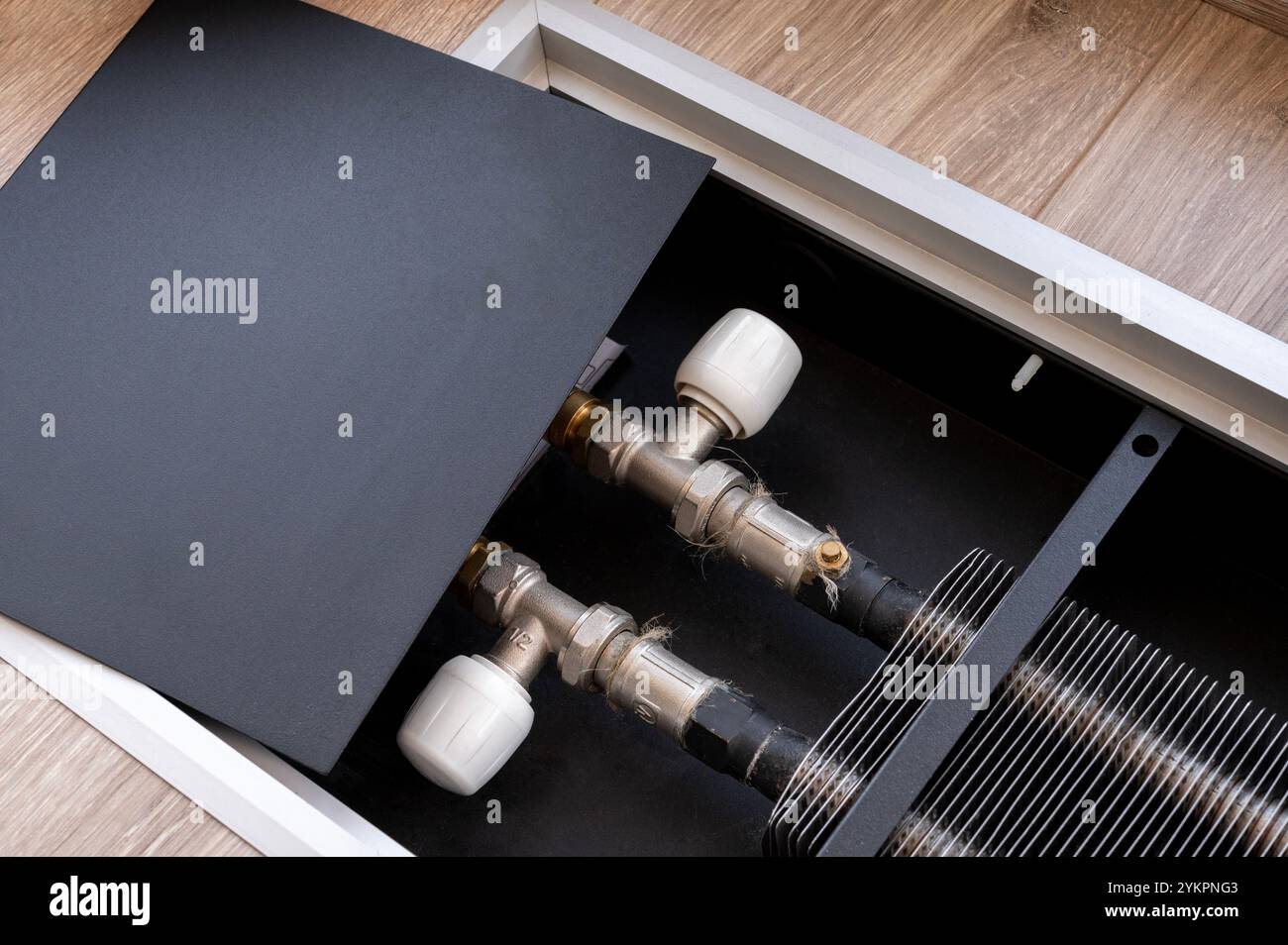 Hot water radiator valves hi-res stock photography and images - Alamy